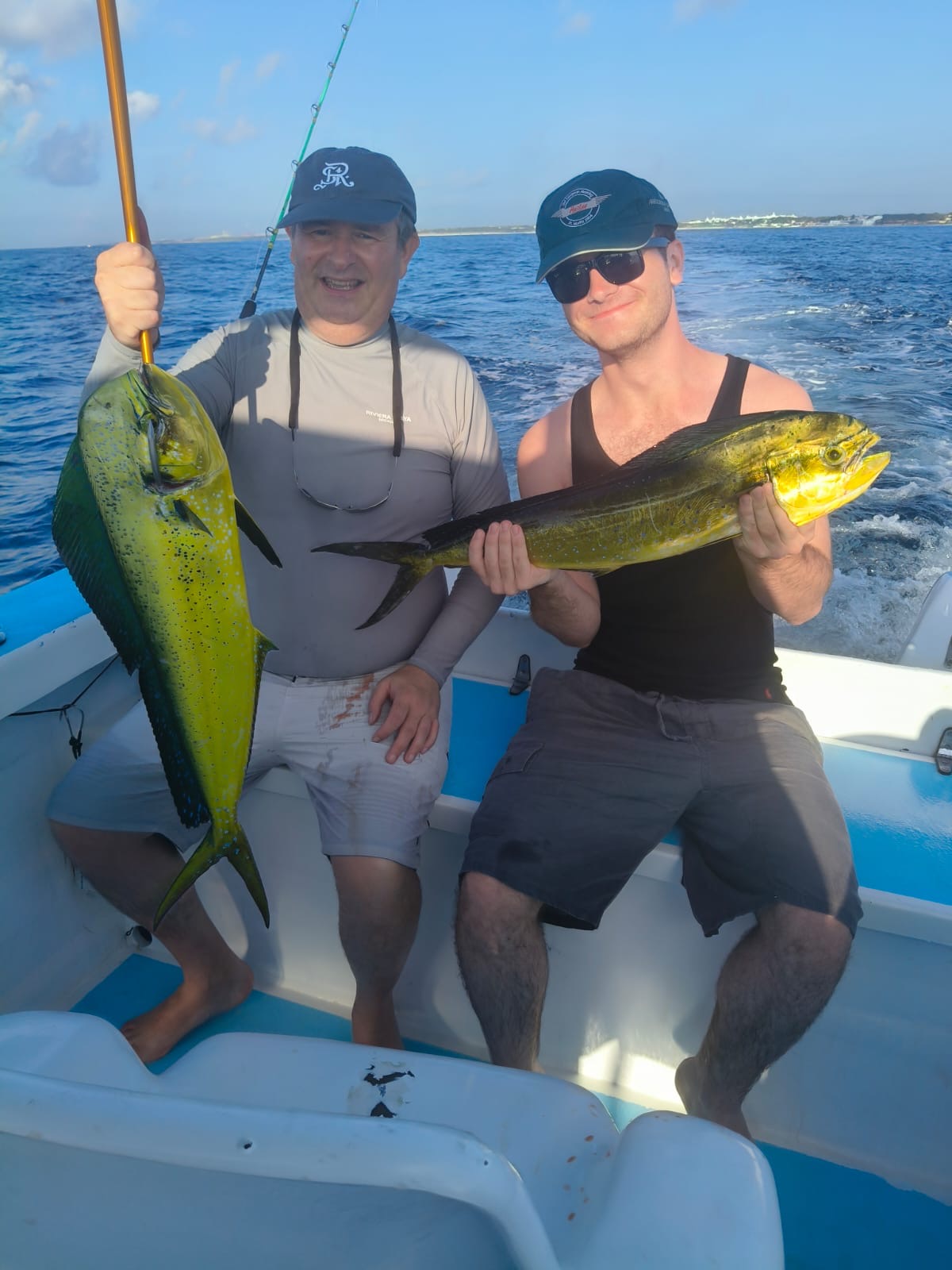 Father & Son Reel in the Big Catch!